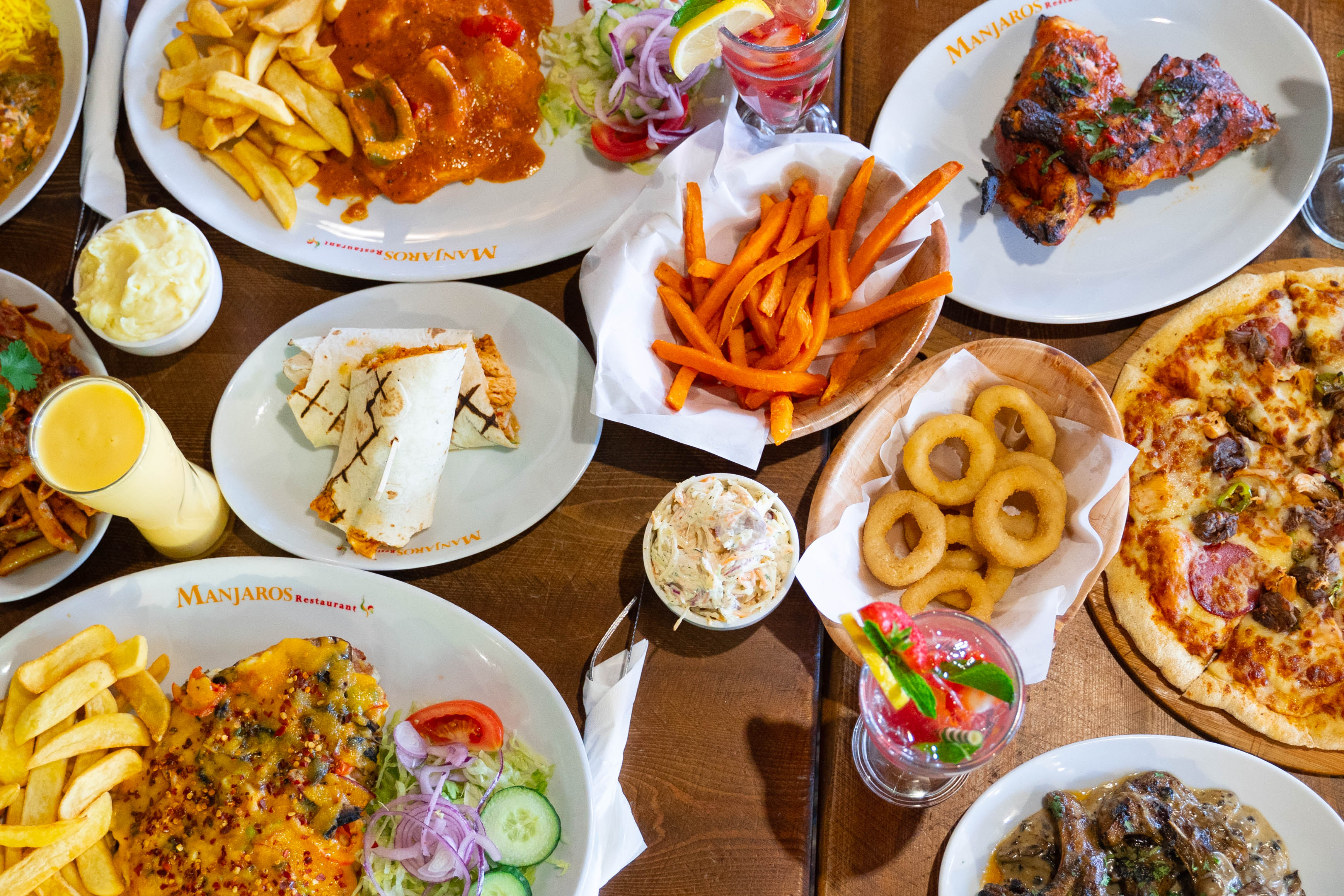 Manjaros Express Menu - Rusholme delivery from Rusholme - Order with ...