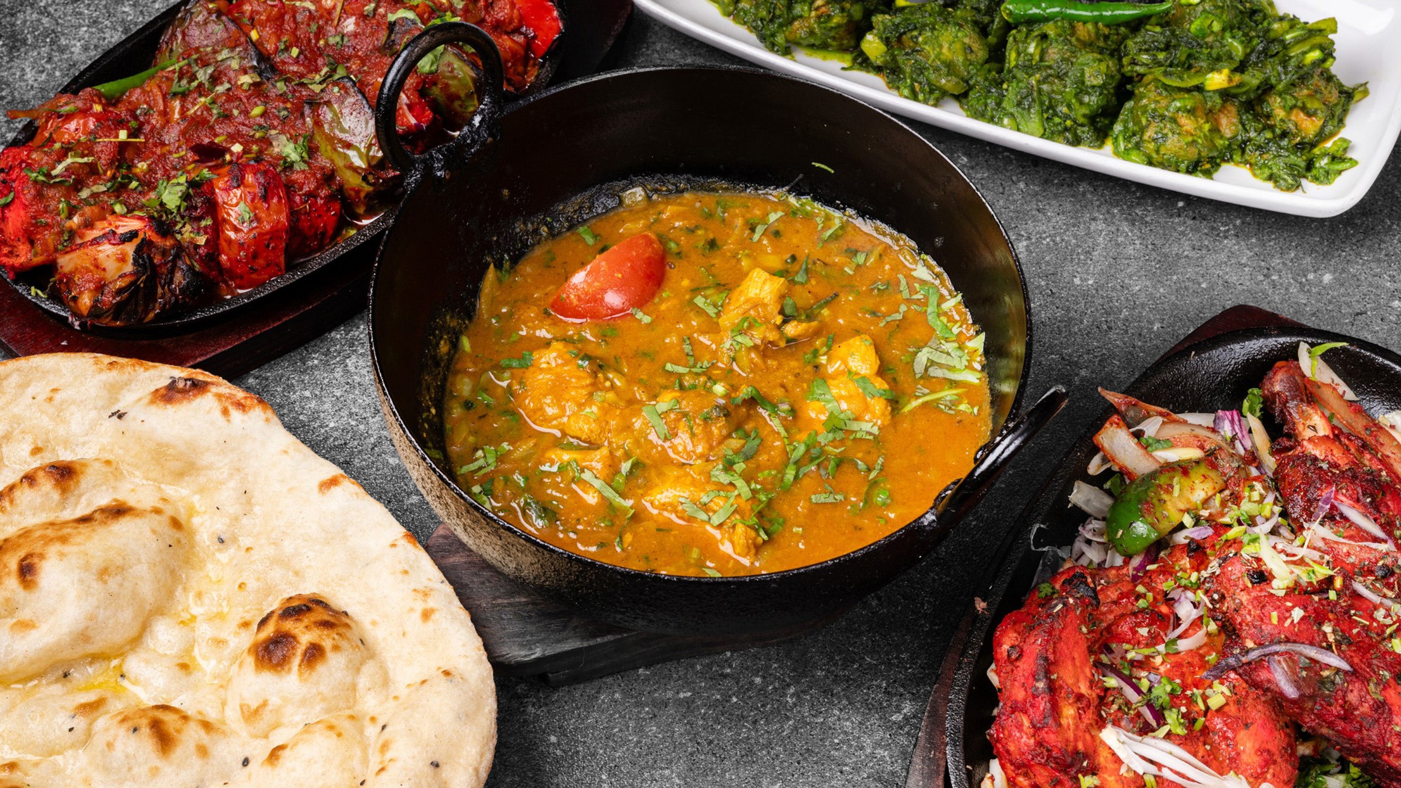 The New Taj Balti House delivery from Saint Austell - Order with Deliveroo
